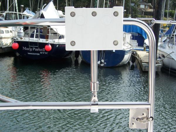 Dinghy engine mount on pushpit rails made from 3/4" Starboard ...