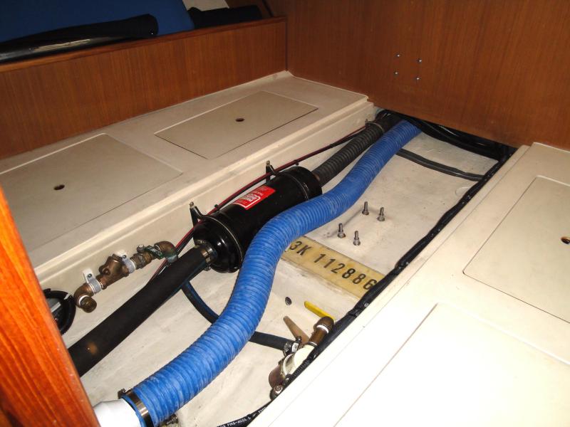 Exhaust fan from the engine compartment leading to a discharge at the ...