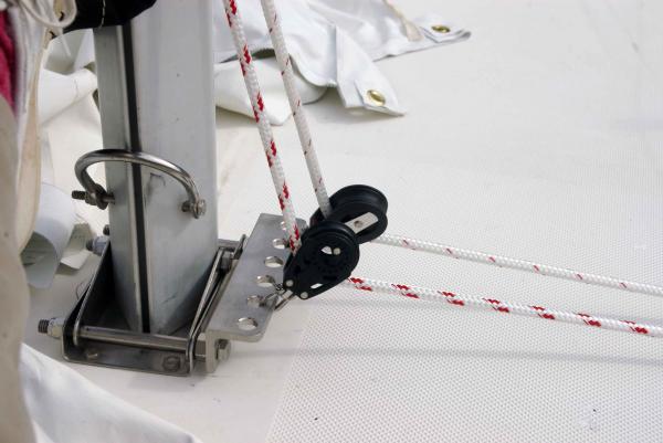 Mast base plate for lines aft; main halyard and reefing line | Sailboat ...